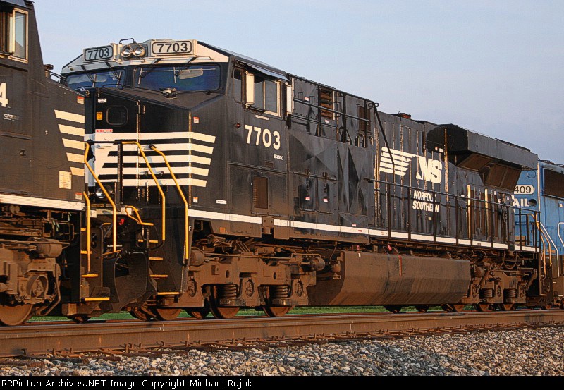 NS 7703